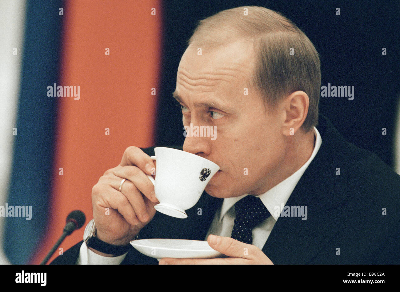 Russian President Vladimir Putin drinking coffee Stock Photo - Alamy