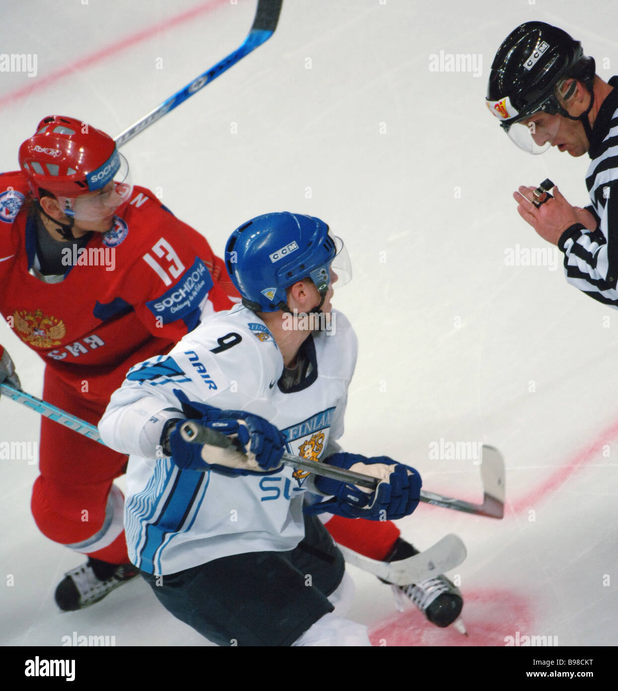 Russian forward Ivan Nepryaev left and Finnish forward Mikko Koivu ...