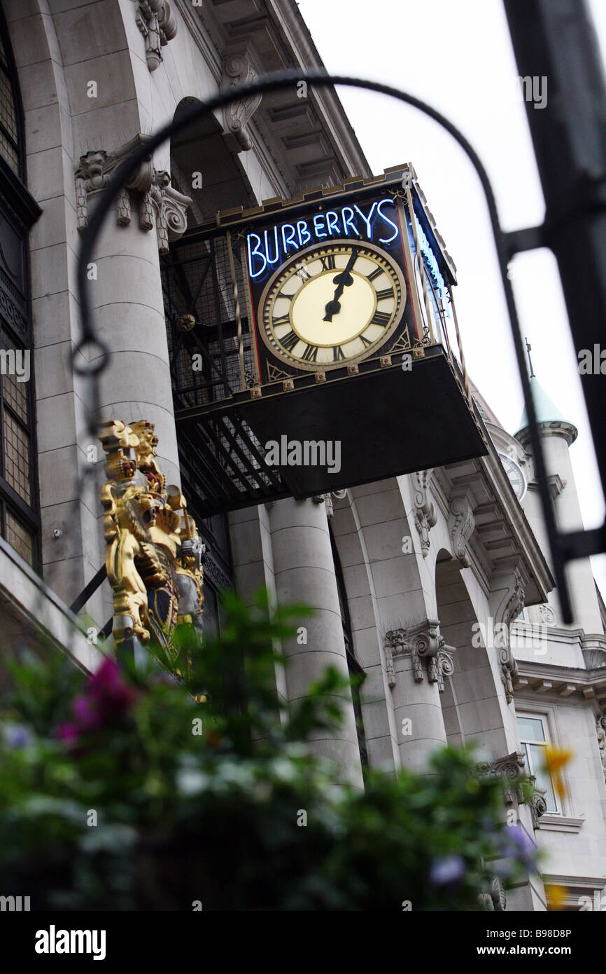 A clock outside the Burberry headquarters in Haymarket London Stock ...