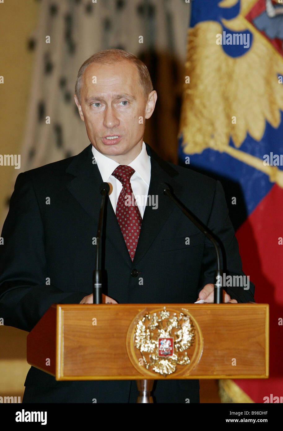 Russian President Vladimir Putin greeting graduates of military ...