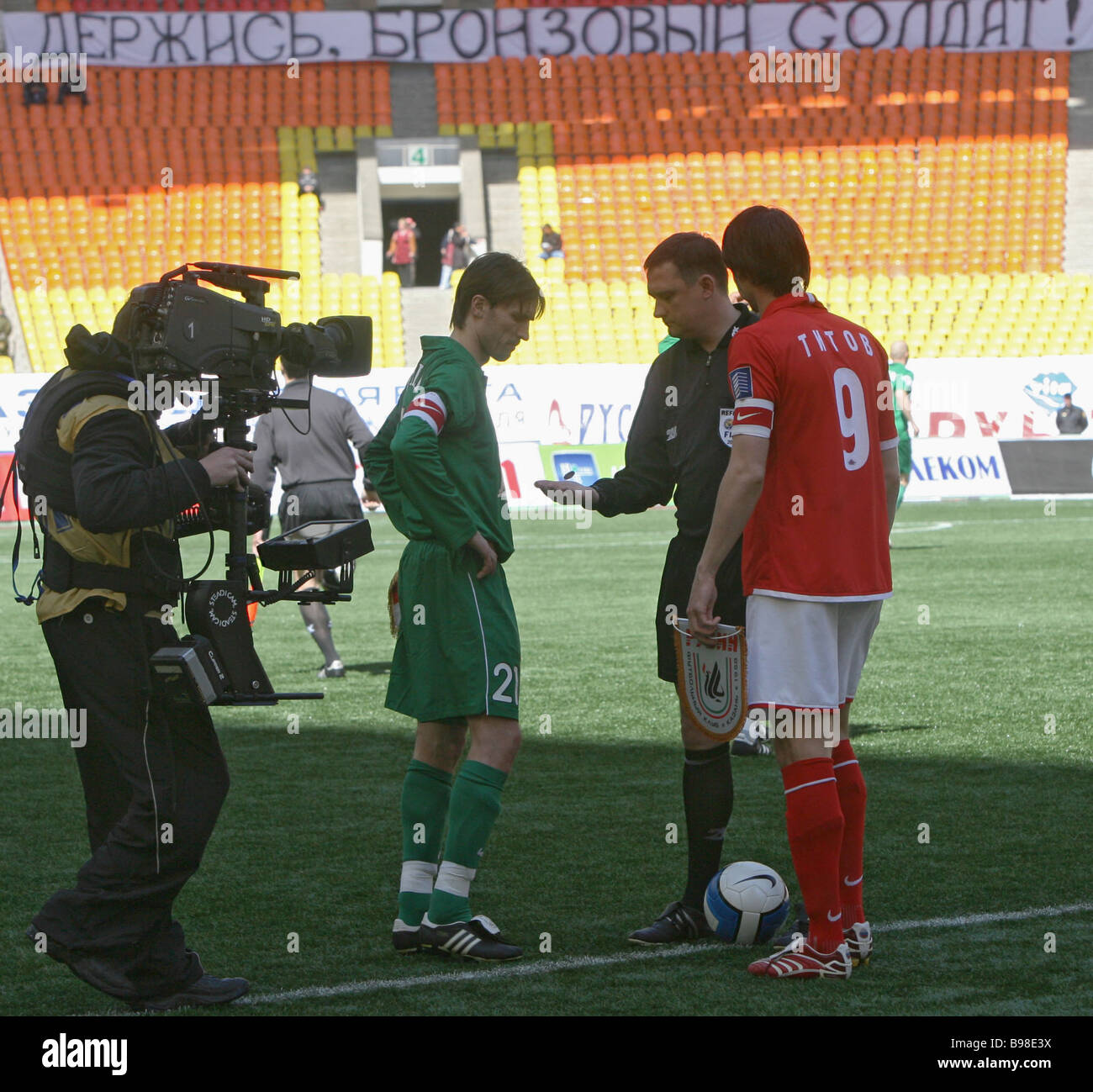 Mikhail Sinev center captain of Rubin Kazan and Yegor Titov right ...