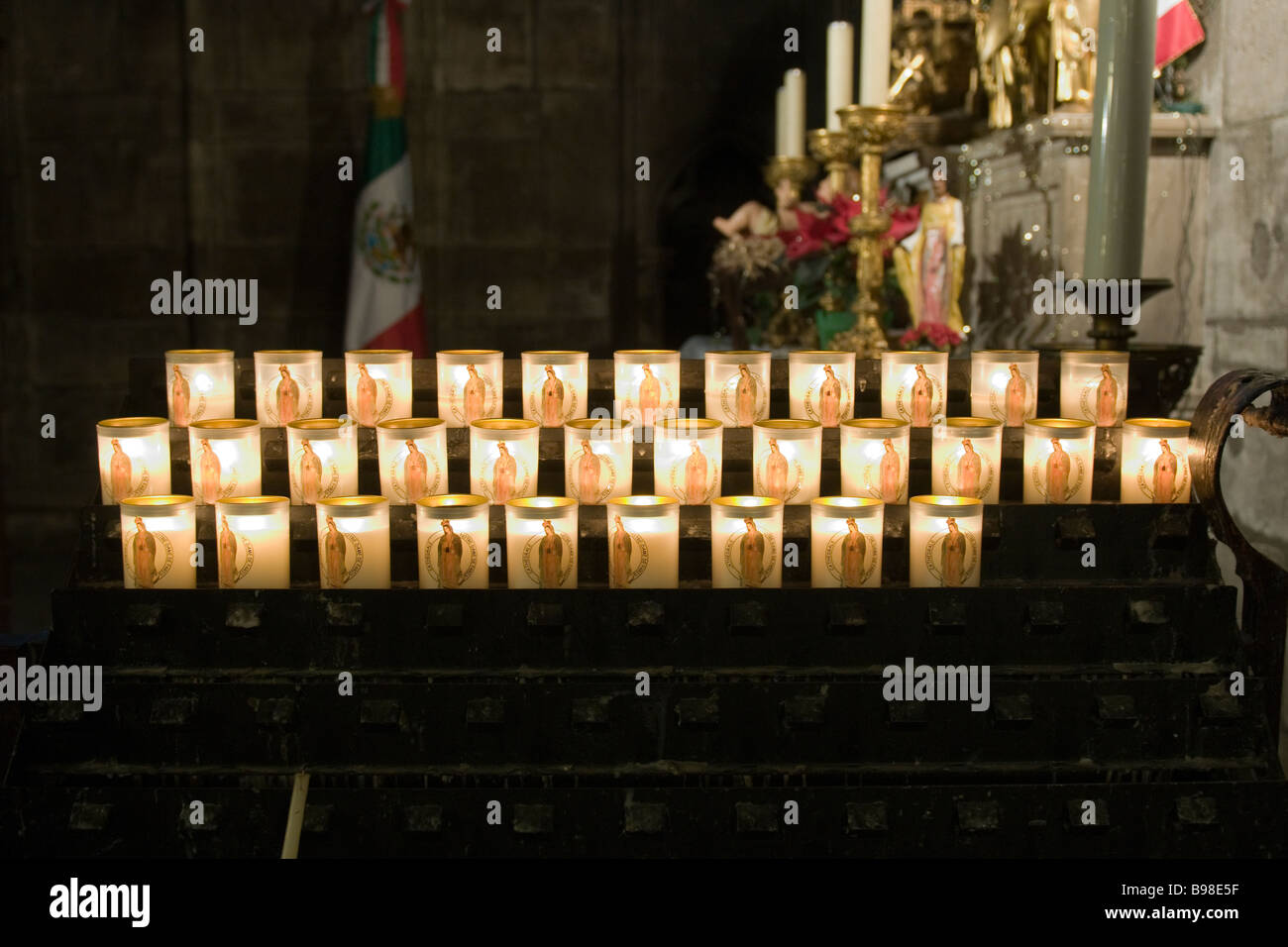 Flaring candles inside Notre Dame de Paris Stock Photo - Alamy