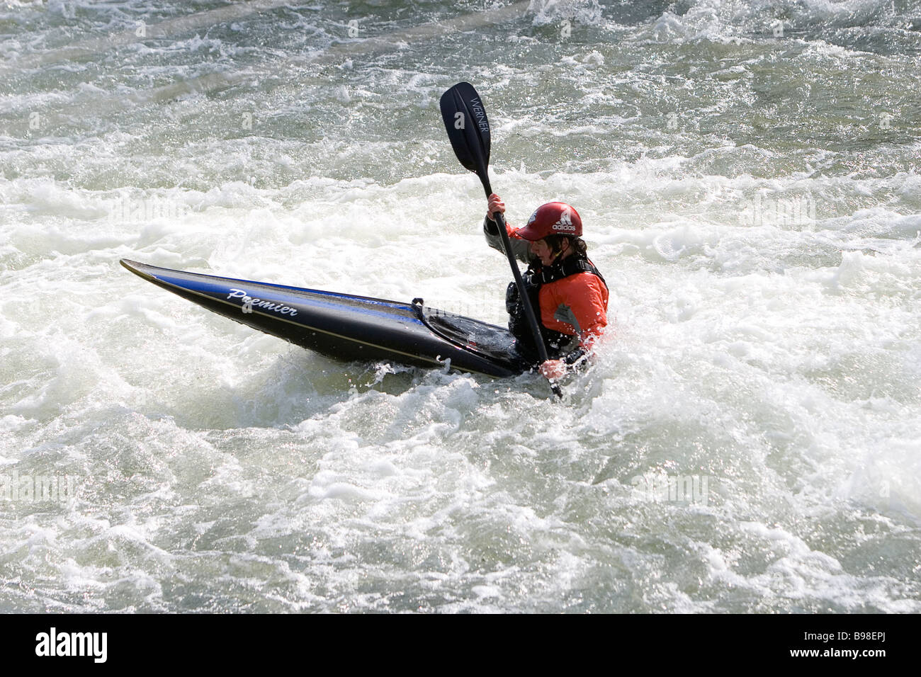 White water canoeing on the River Thames at Shepperton Weir Stock Photo ...
