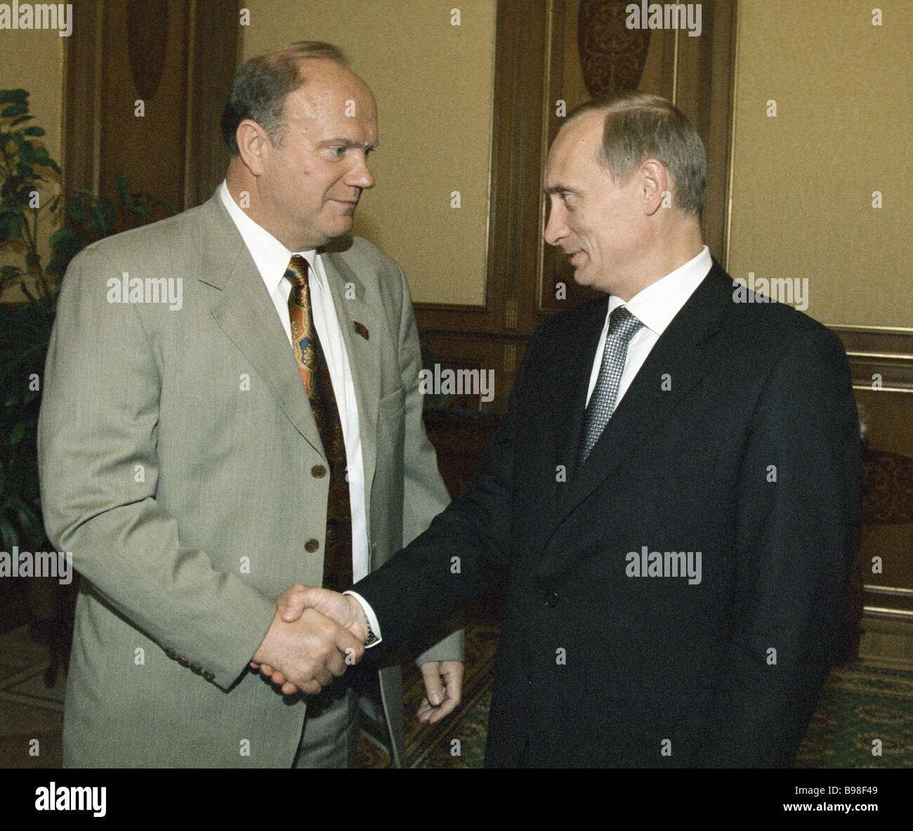 Vladimir Putin Russia s Prime Minister right and Gennady Zyuganov ...