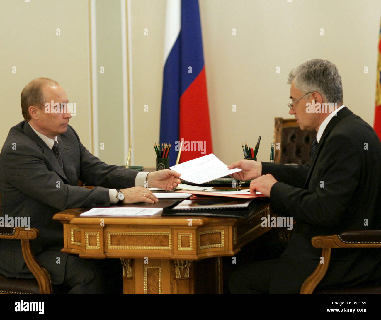 Russian President Vladimir Putin left and Arkhangelsk Governor Nikolai Kiselev meeting in Novo ...