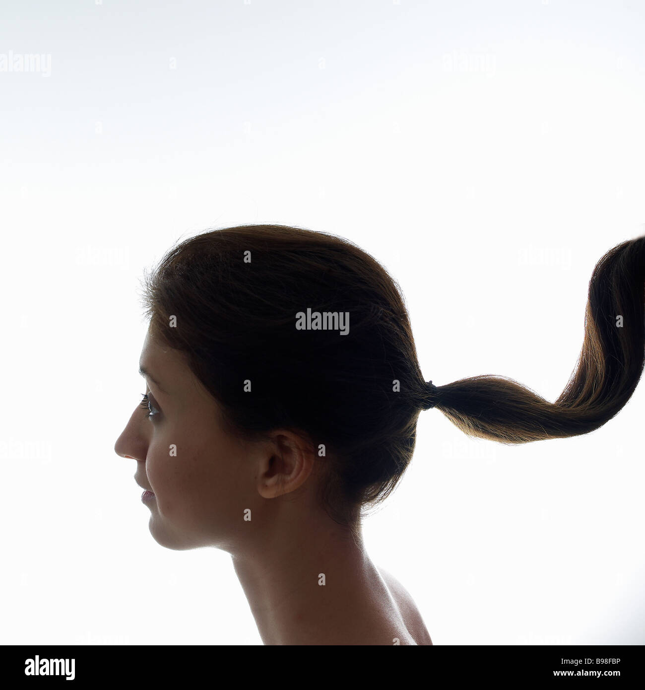 Woman with a ponytail hi-res stock photography and images - Alamy