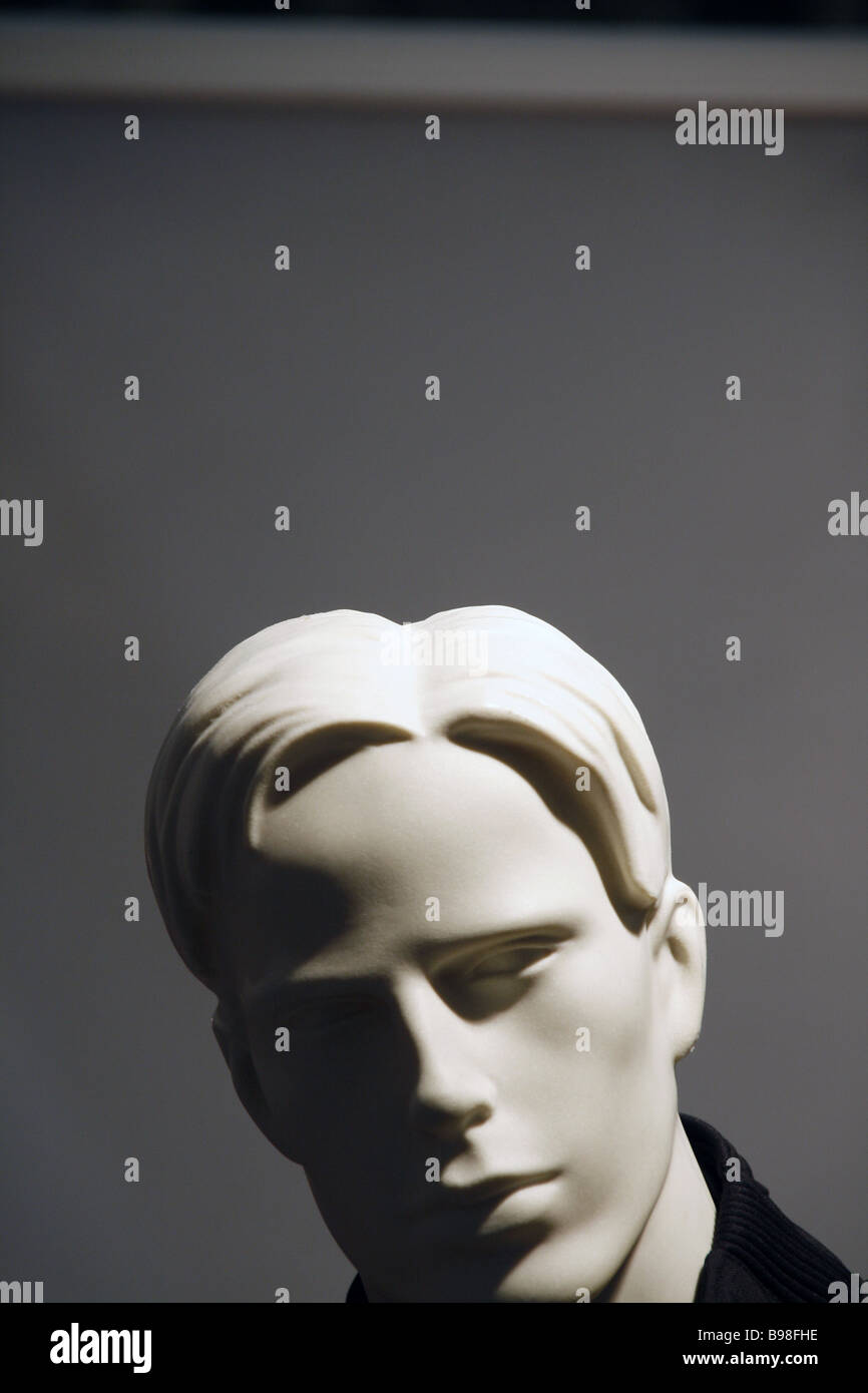 male mannequin in shop window at night Stock Photo - Alamy