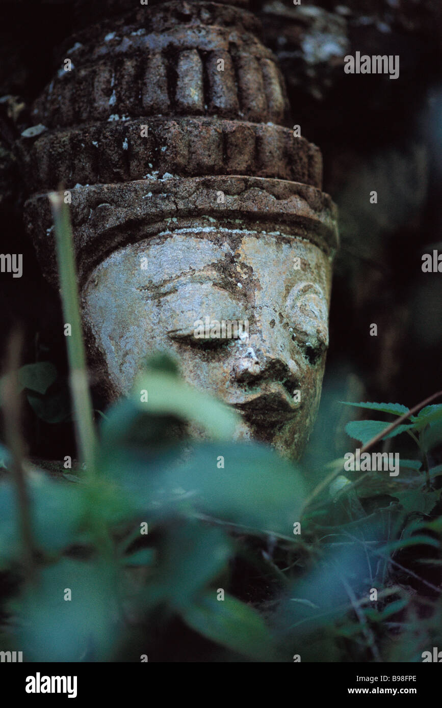 Placid face of Buddha, statue in forest Stock Photo - Alamy