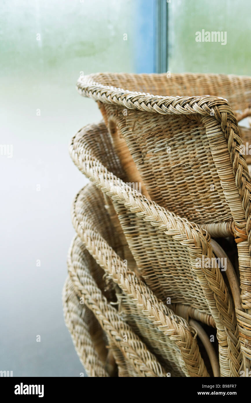 Stack of wicker chairs, cropped Stock Photo - Alamy