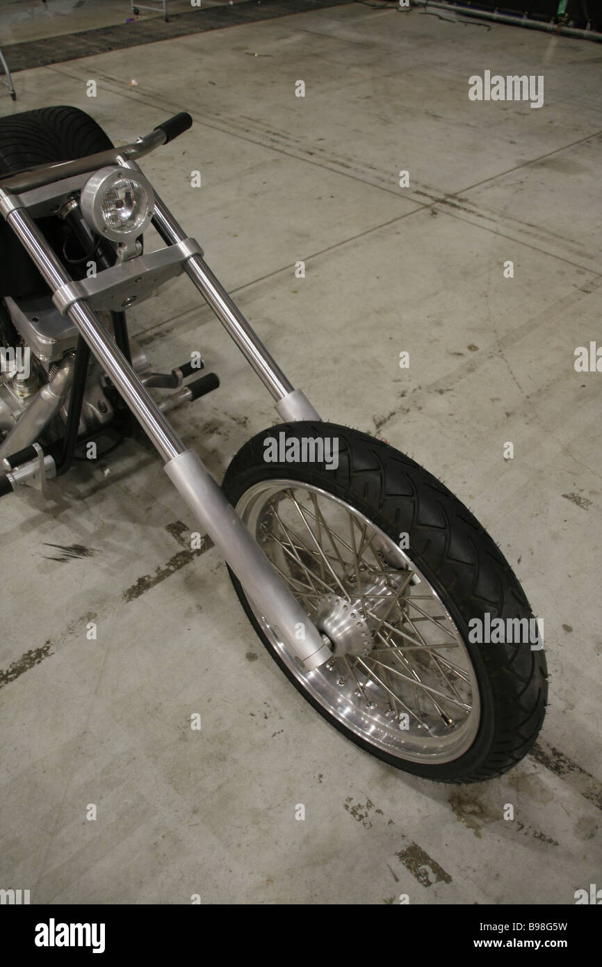 one customised black chopper motorbike at motor show Stock Photo - Alamy