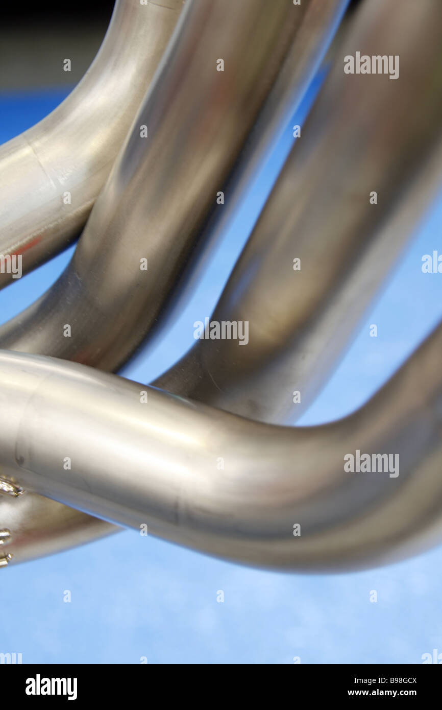 close up detail of exhaust pipes on sports racing motorbike at motor ...