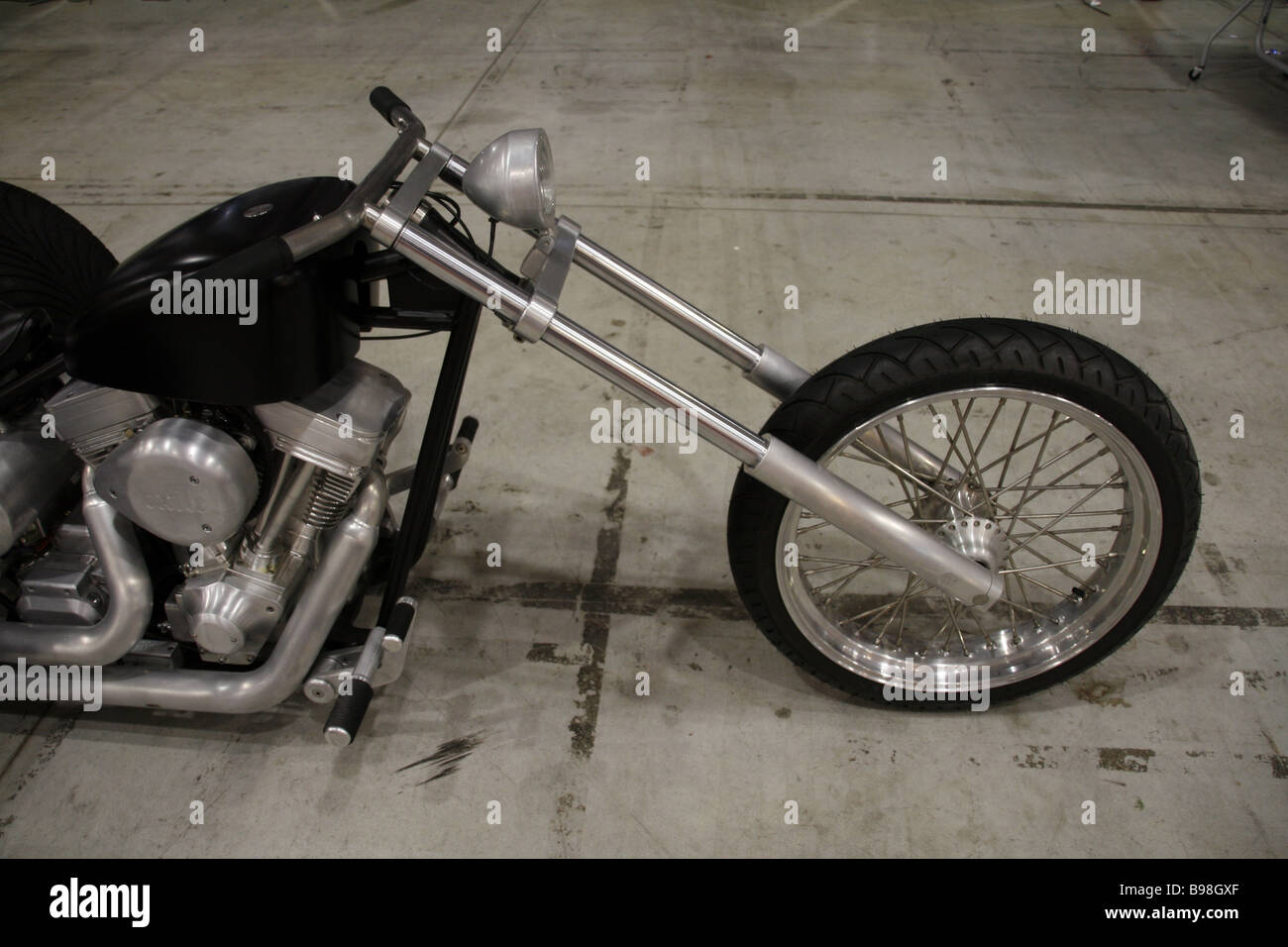 one customised black chopper motorbike at motor show Stock Photo - Alamy