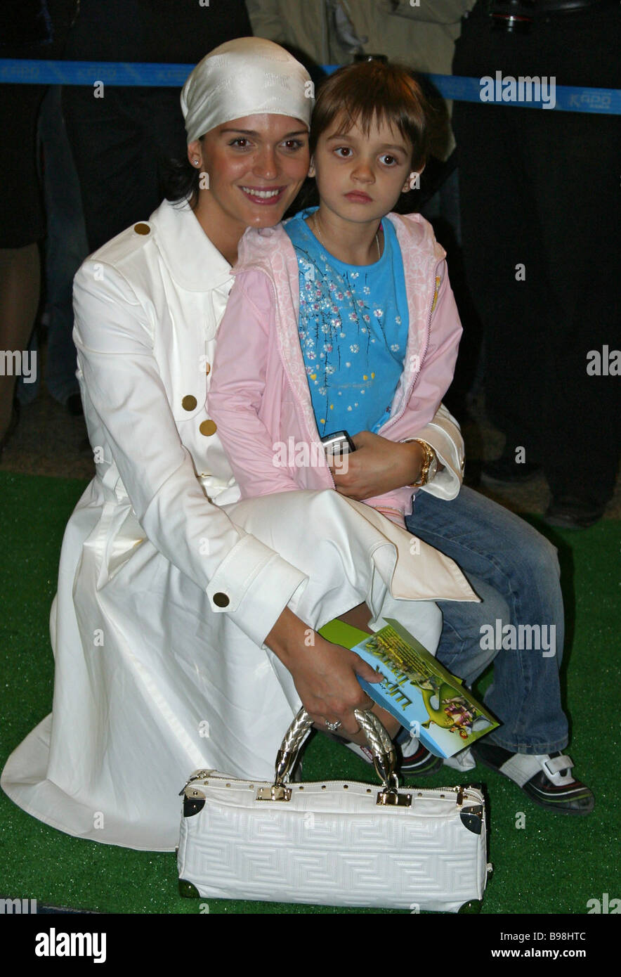 Pop singer Slava and her little daughter Sasha at the Oktyabr cinema ...