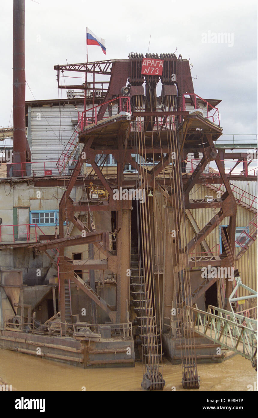 A gold mining dredge at a coastal dressing mill of ZAO Aldgold mining ...
