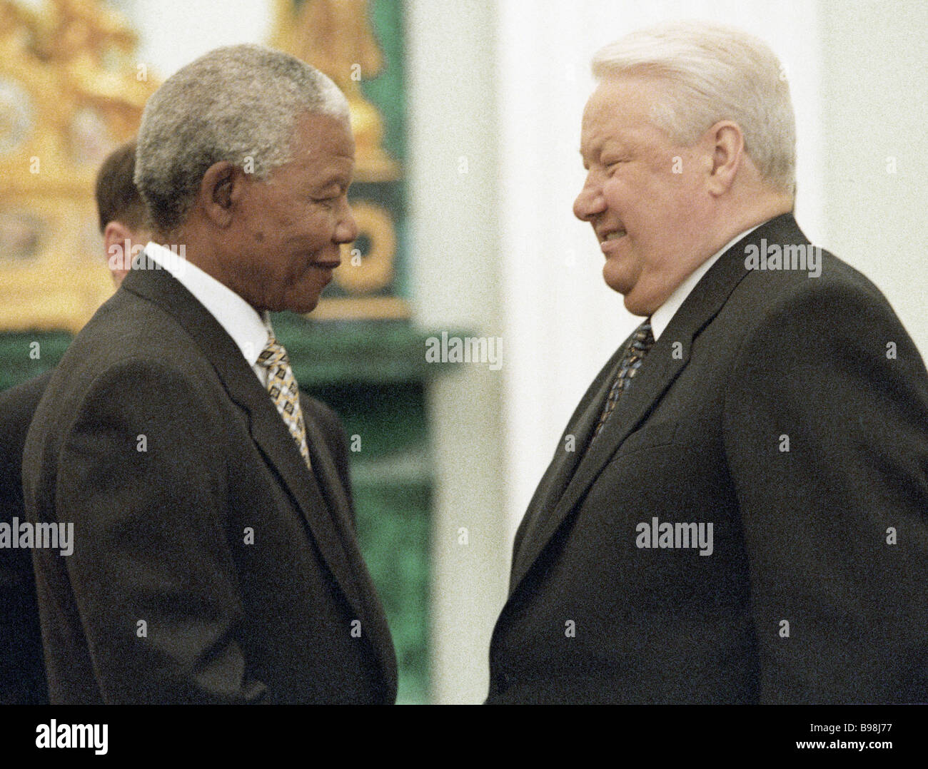 South African President Nelson Mandela left and Russian President Boris Yeltsin right meet each ...