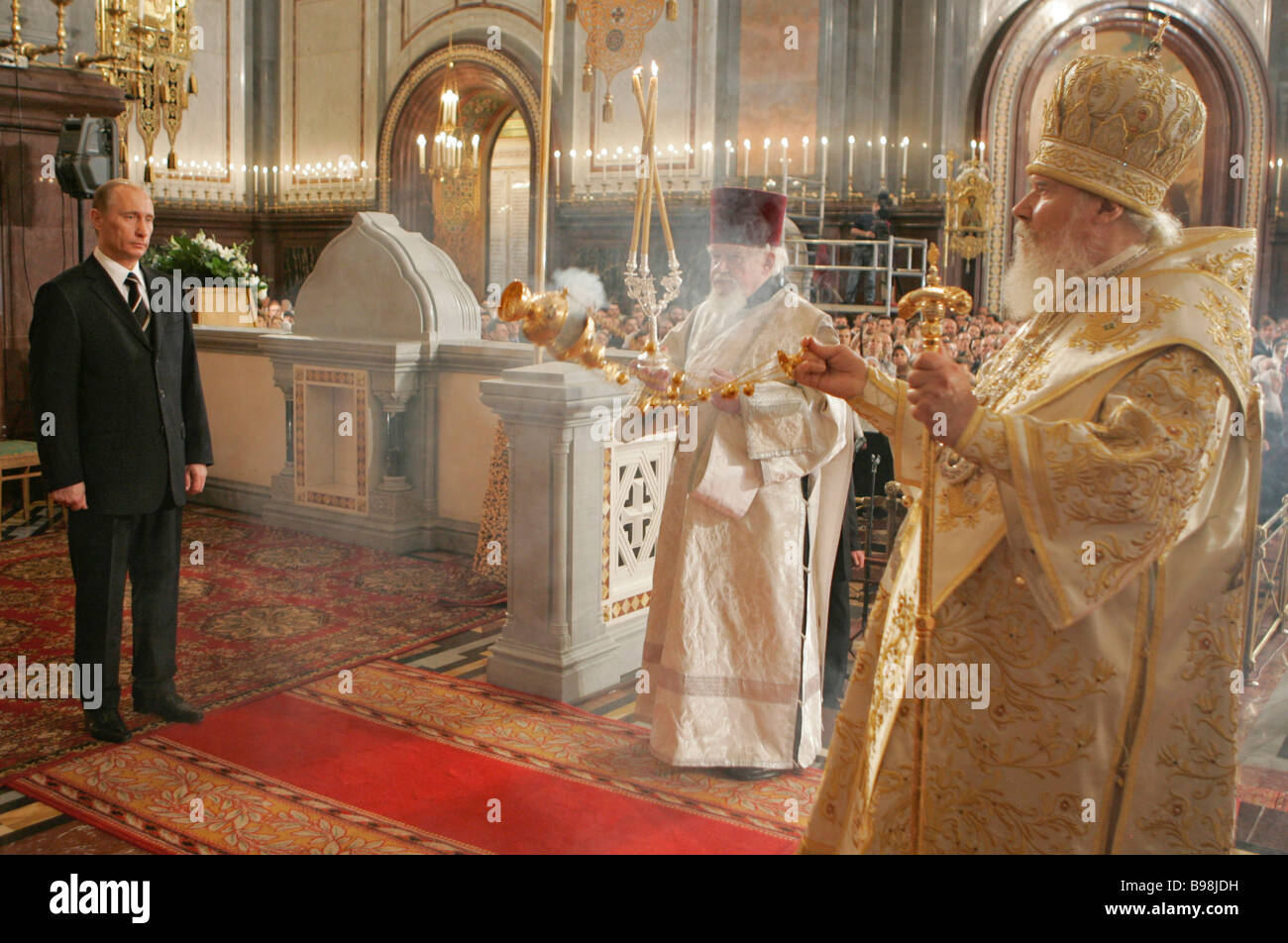 Russian President Vladimir Putin and Patriarch Alexius II of Moscow and ...