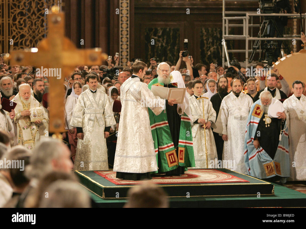 The ceremony of signing a historic church unification act ...