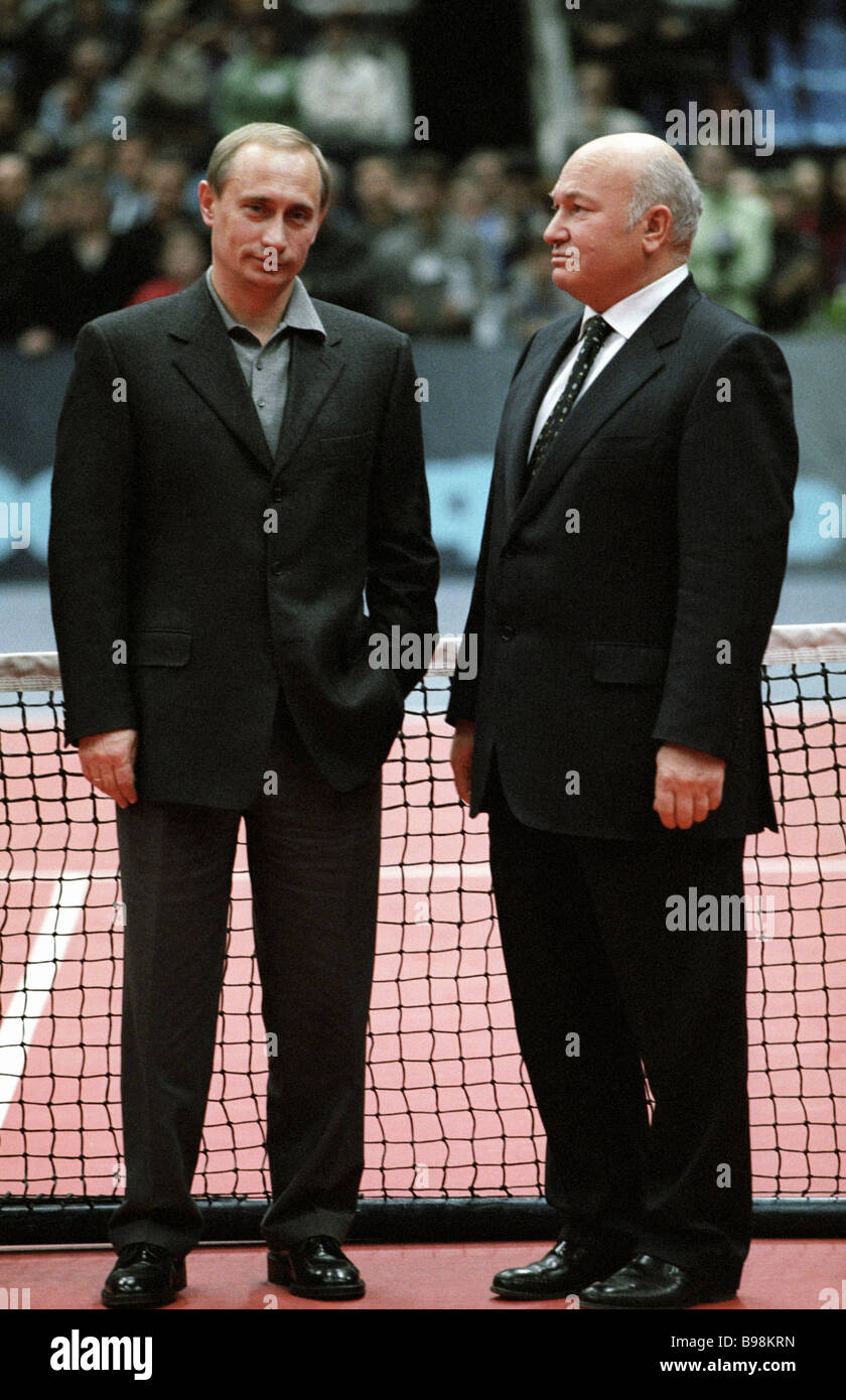 Russian Prime Minister Vladimir Putin left and Moscow Mayor Yury ...