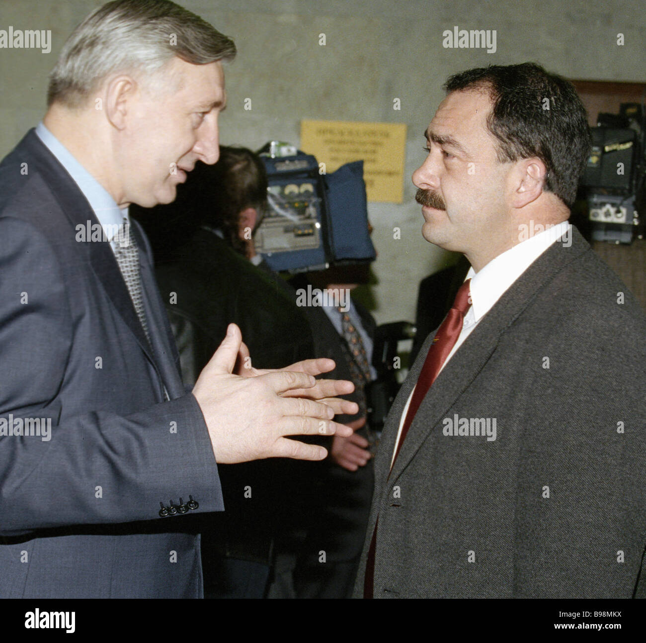First Deputy Prime Minister Nikolai Aksenenko left and Mikhail ...