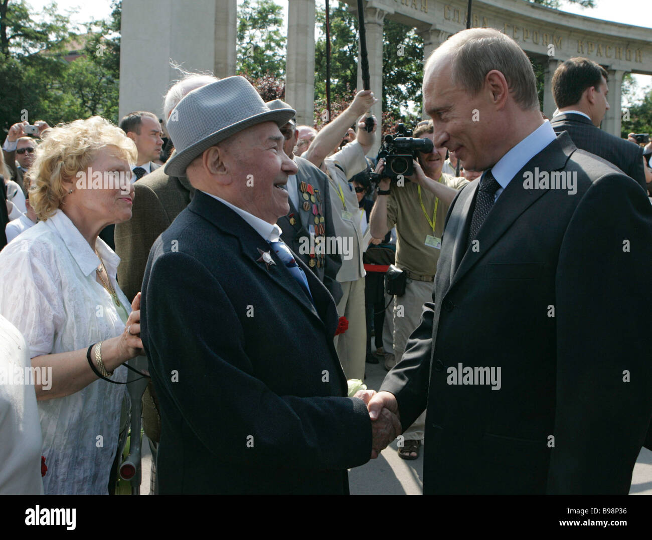 Russian President Vladimir Putin right visits the Church of St Nicholas ...