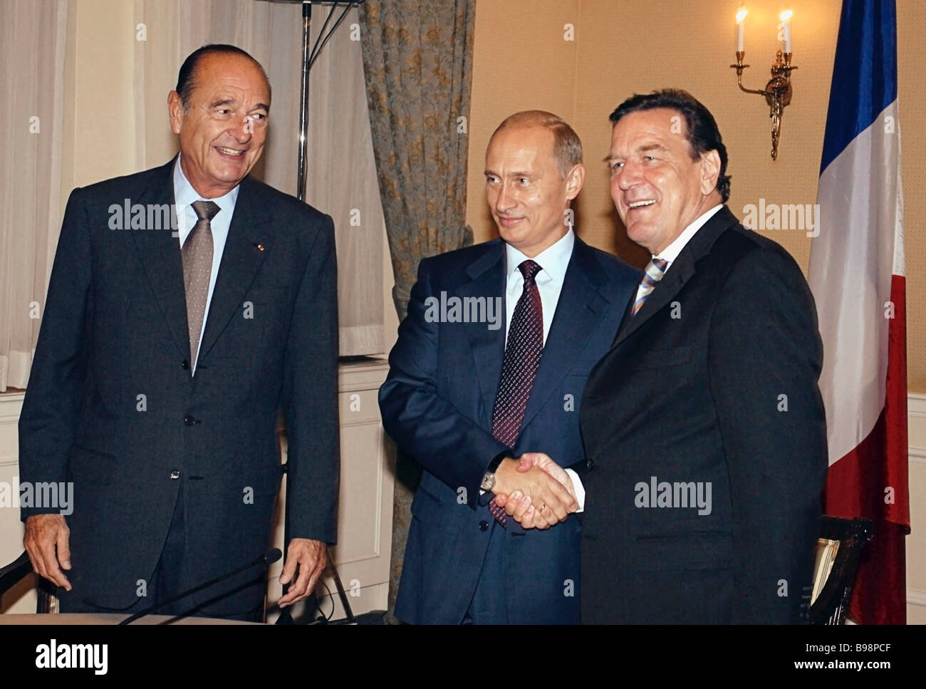 Russian President Vladimir Putin French President Jacques Chirac center ...