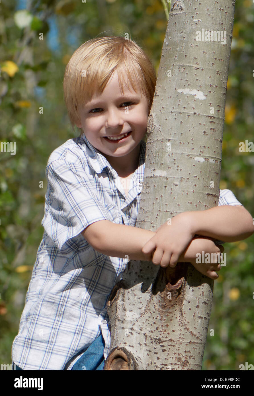 Portrait of the nice boy in park Stock Photo - Alamy