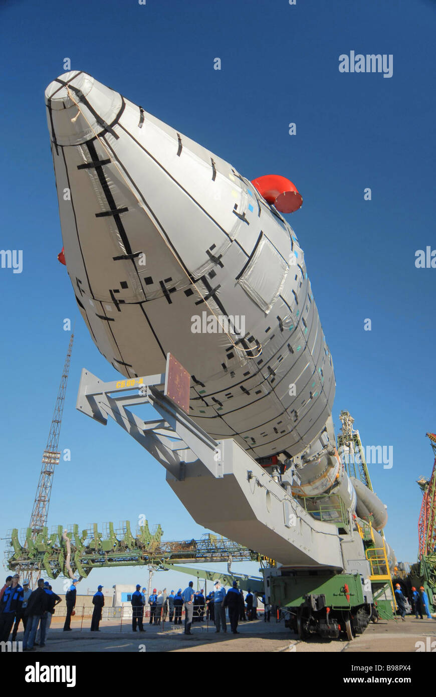 A Soyuz FG rocket with GlobalStar satellites being installed at the ...