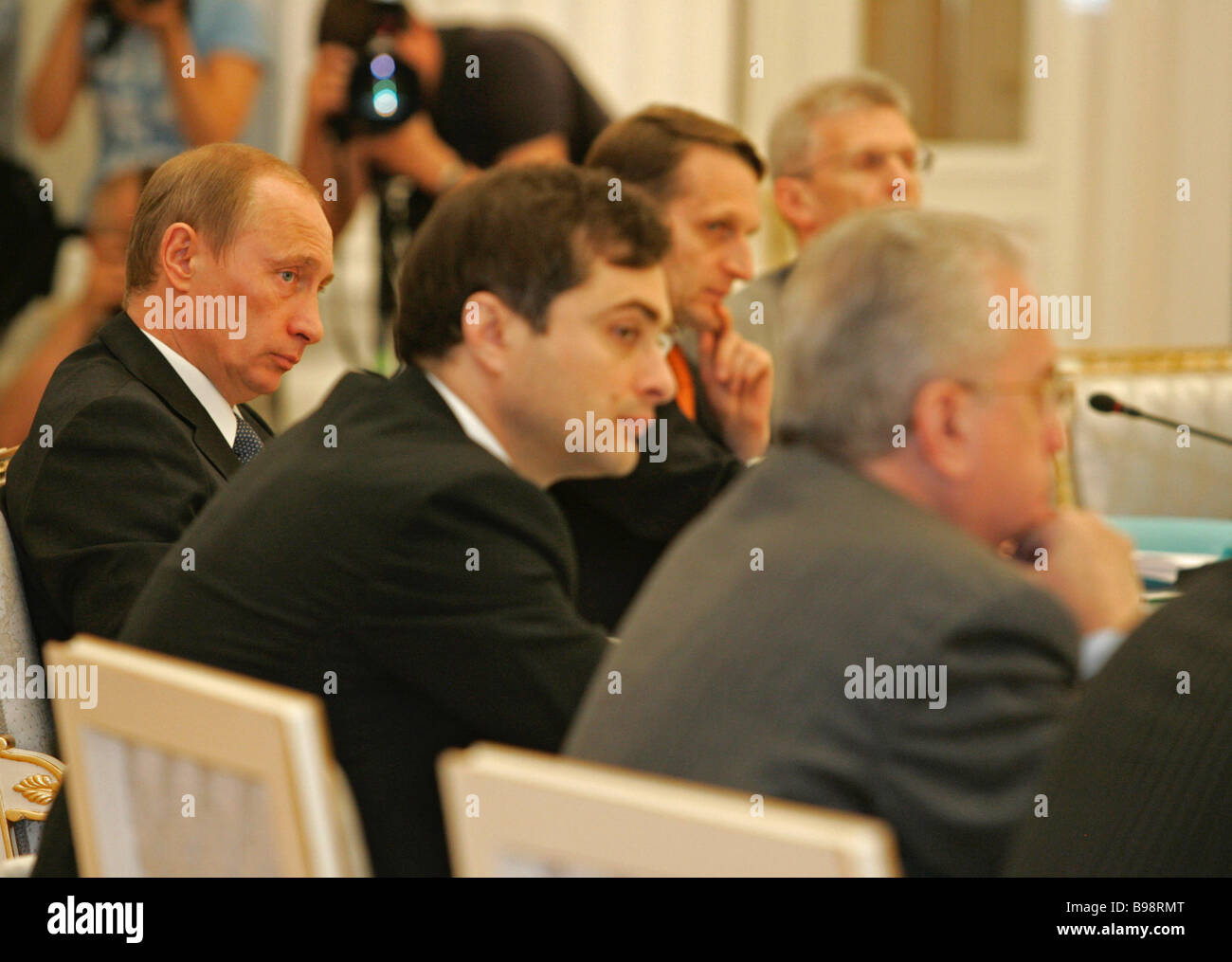 Left to right foreground Russian President Vladimir Putin Vladislav ...