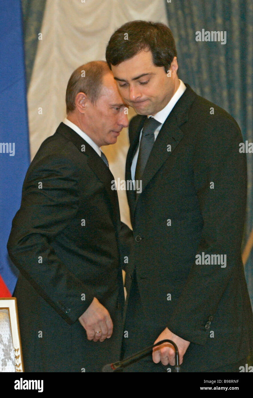 Russian President Vladimir Putin left and Vladislav Surkov deputy head ...