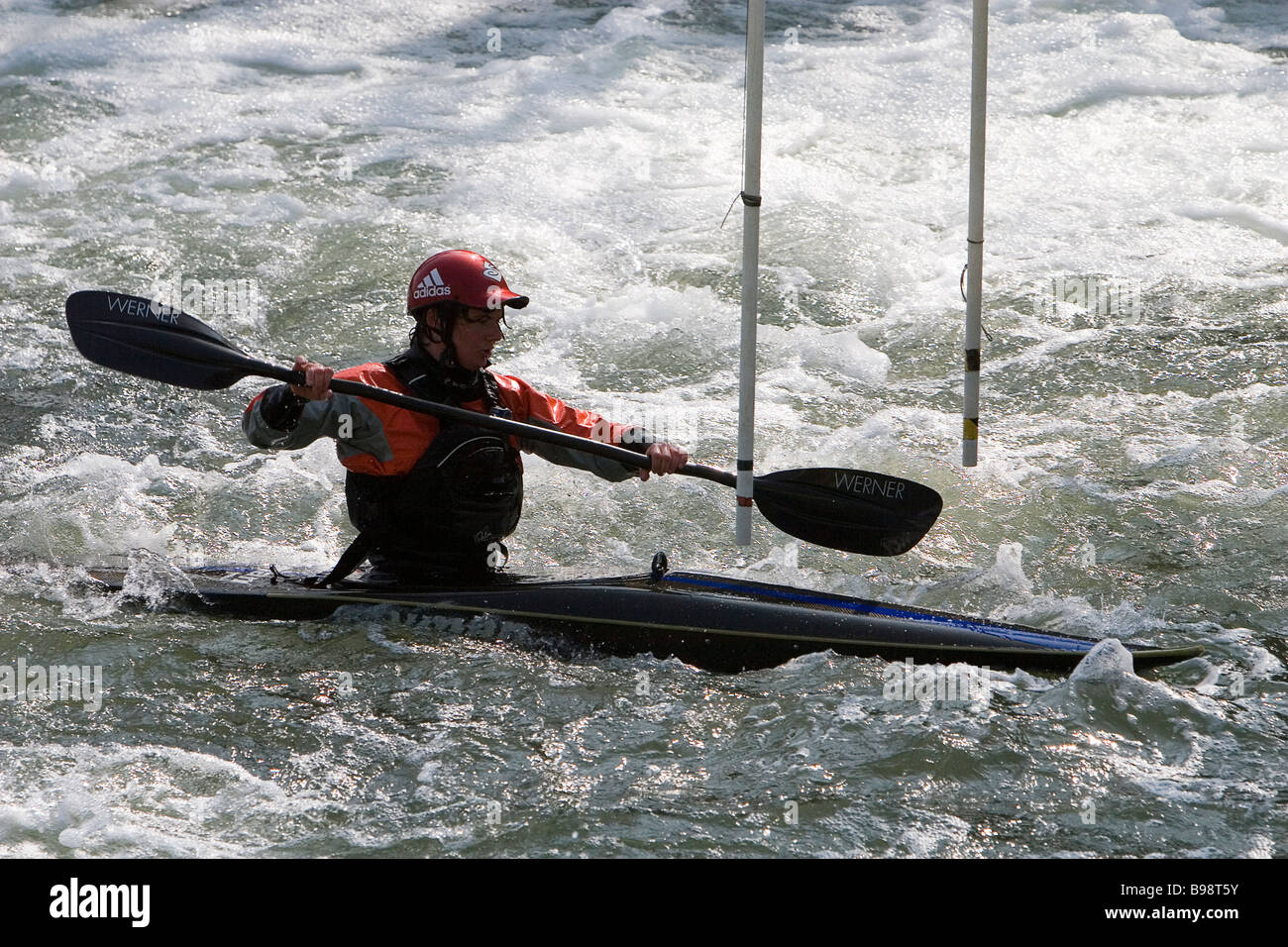 White water canoeing on the River Thames at Shepperton Weir Stock Photo ...