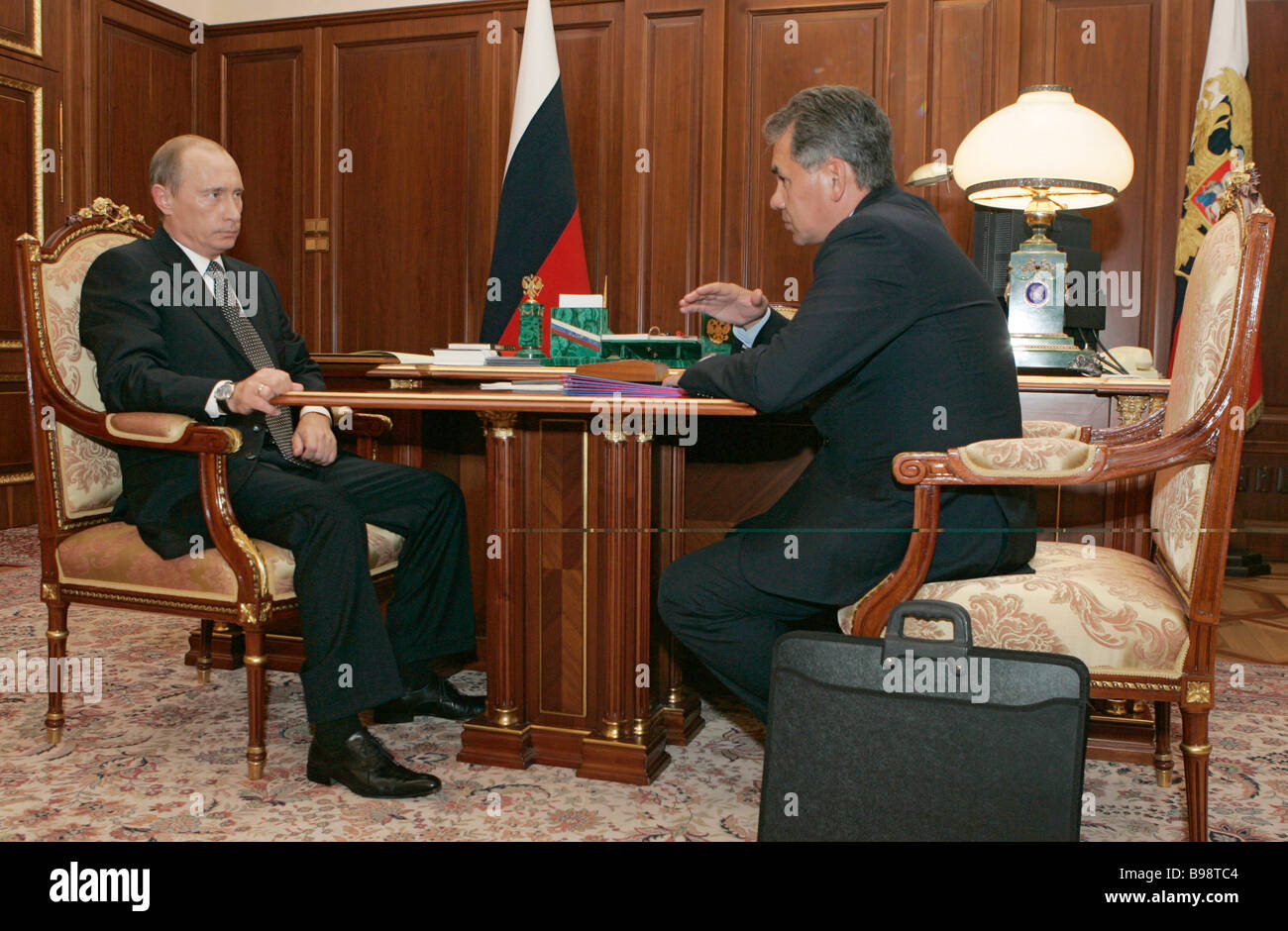 Russian President Vladimir Putin left and Emergency Situations Minister ...