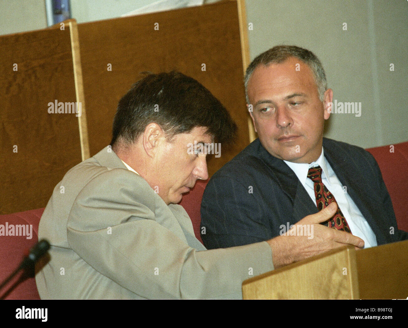 State Duma members Vladimir Bryntsalov left and Andrei Kozyrev talk in ...