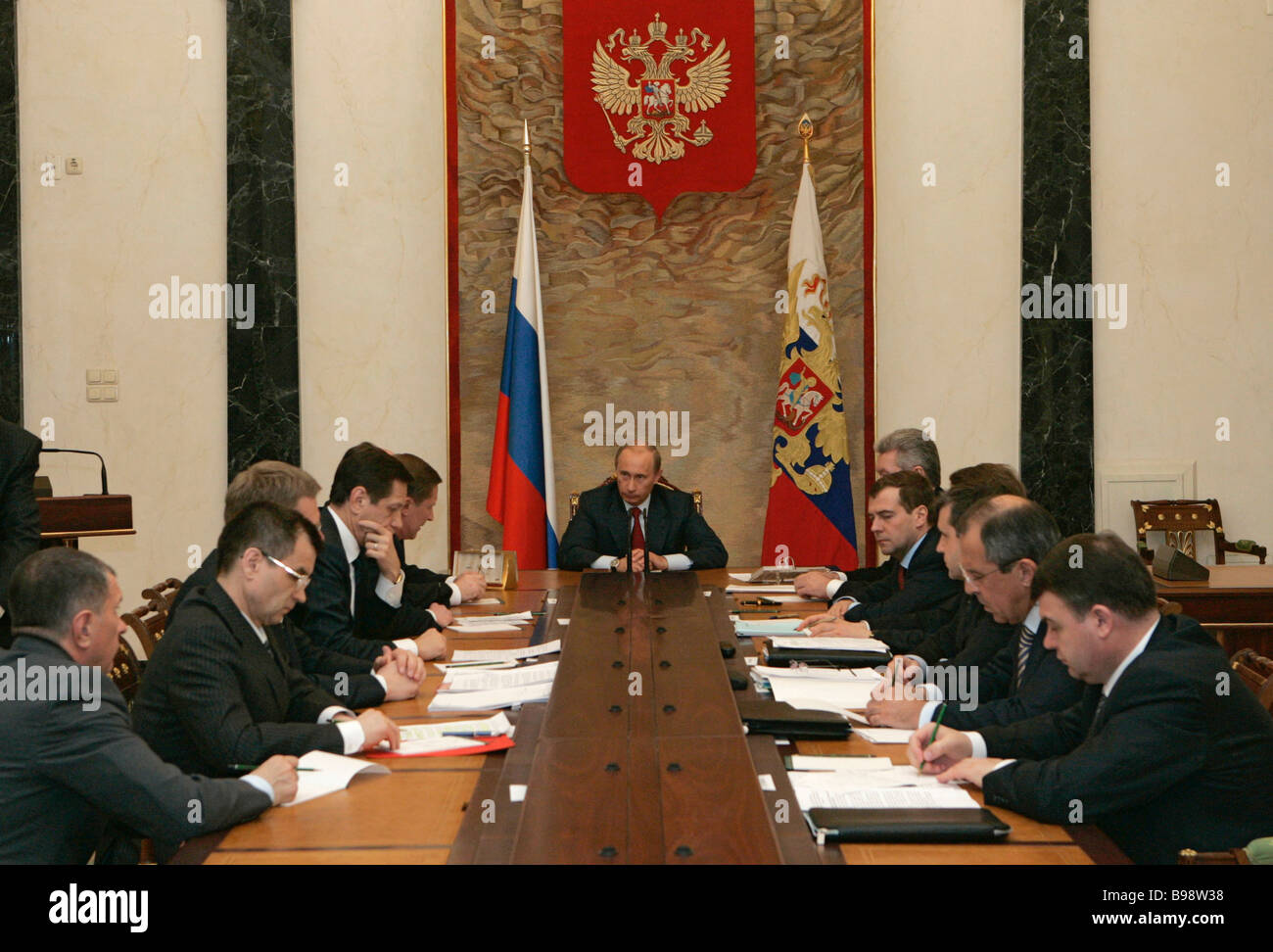 Russian President Vladimir Putin in the center meeting with government ...
