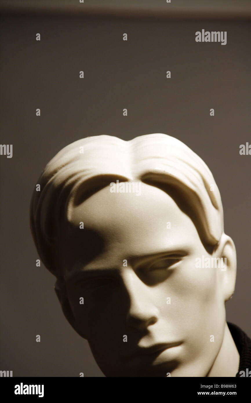 male mannequin in shop window at night Stock Photo - Alamy