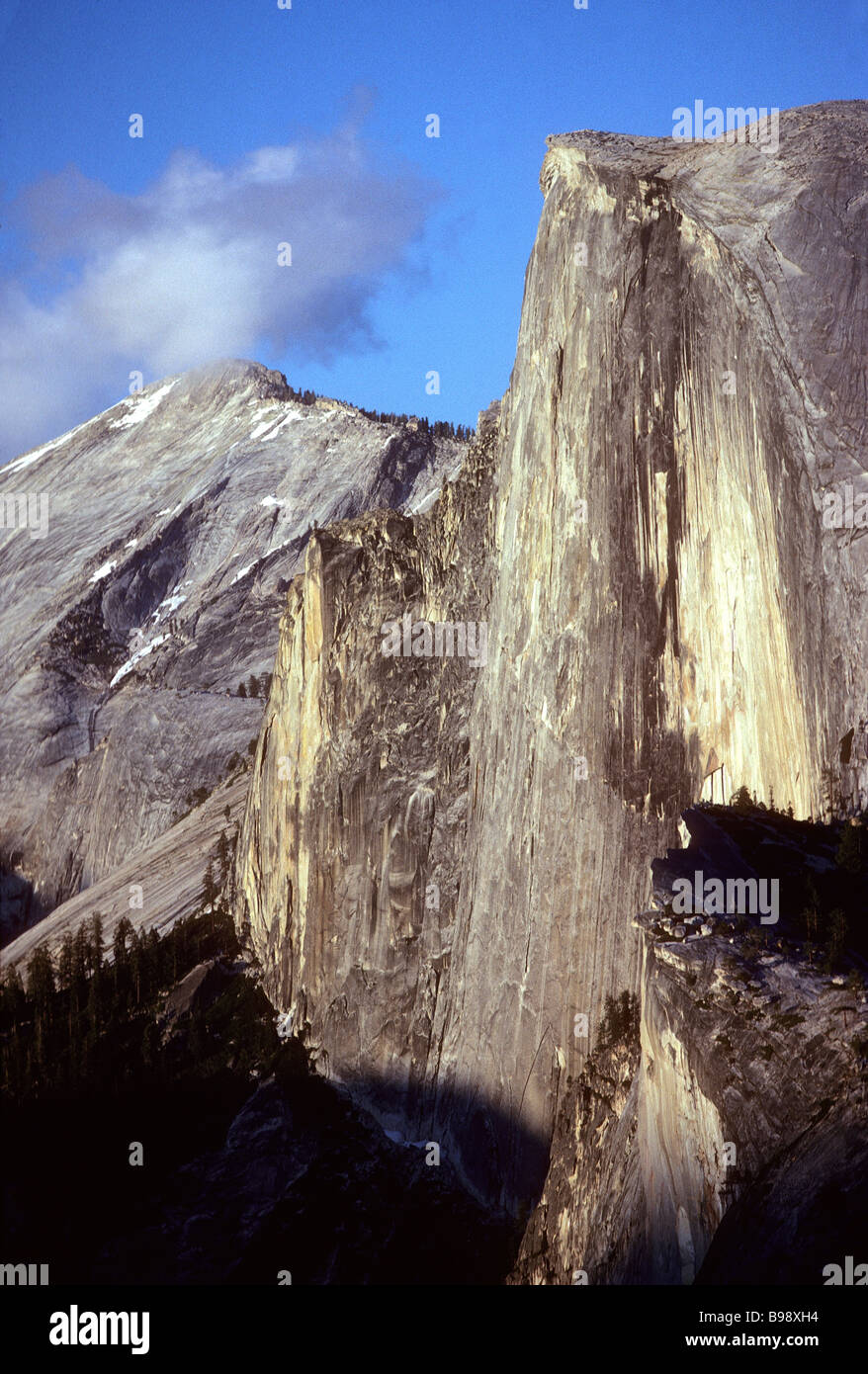 Northwest Face of Half Dome with cloud hovering over Clouds Rest ...
