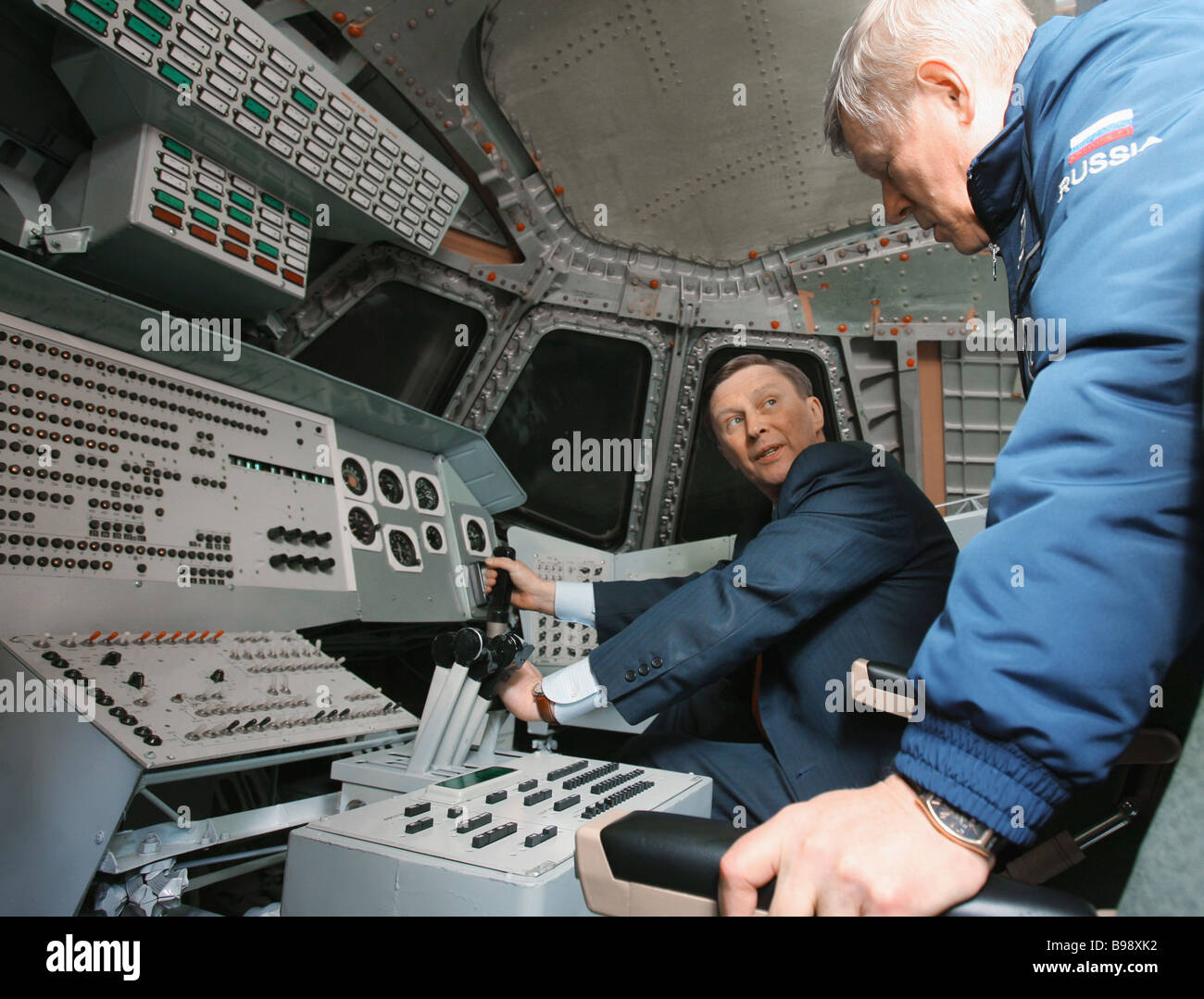 Russia s First Deputy Prime Minister Sergei Ivanov examines cockpit of ...