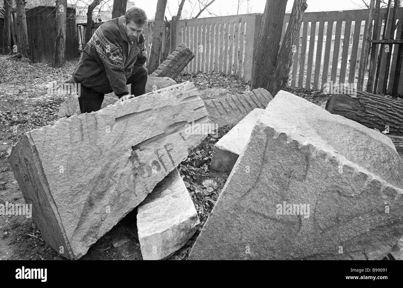 Sculptor Andrei Smirnov selecting material for his work Stock Photo - Alamy
