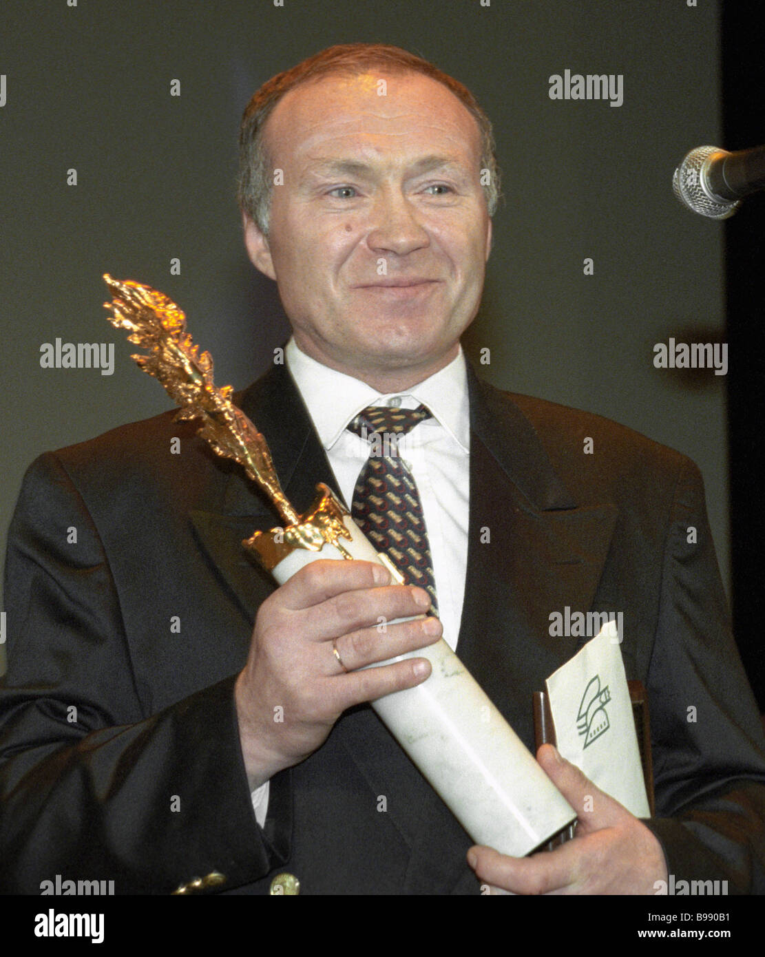 Actor Yury Kuznetsov holds prize for best male act in film Brat The ...
