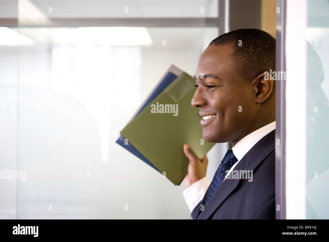 Businessman holding files hi-res stock photography and images - Alamy