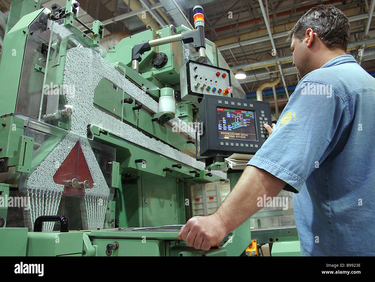 A filter cigarette line operator Stock Photo - Alamy