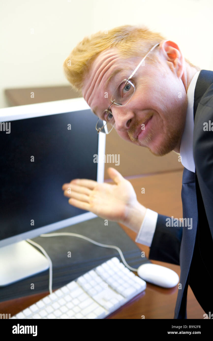 Man peering at computer hi-res stock photography and images - Alamy