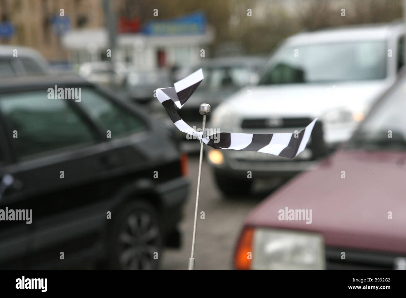 White and black ribbon is a symbol of responsible behavior on roads A ...