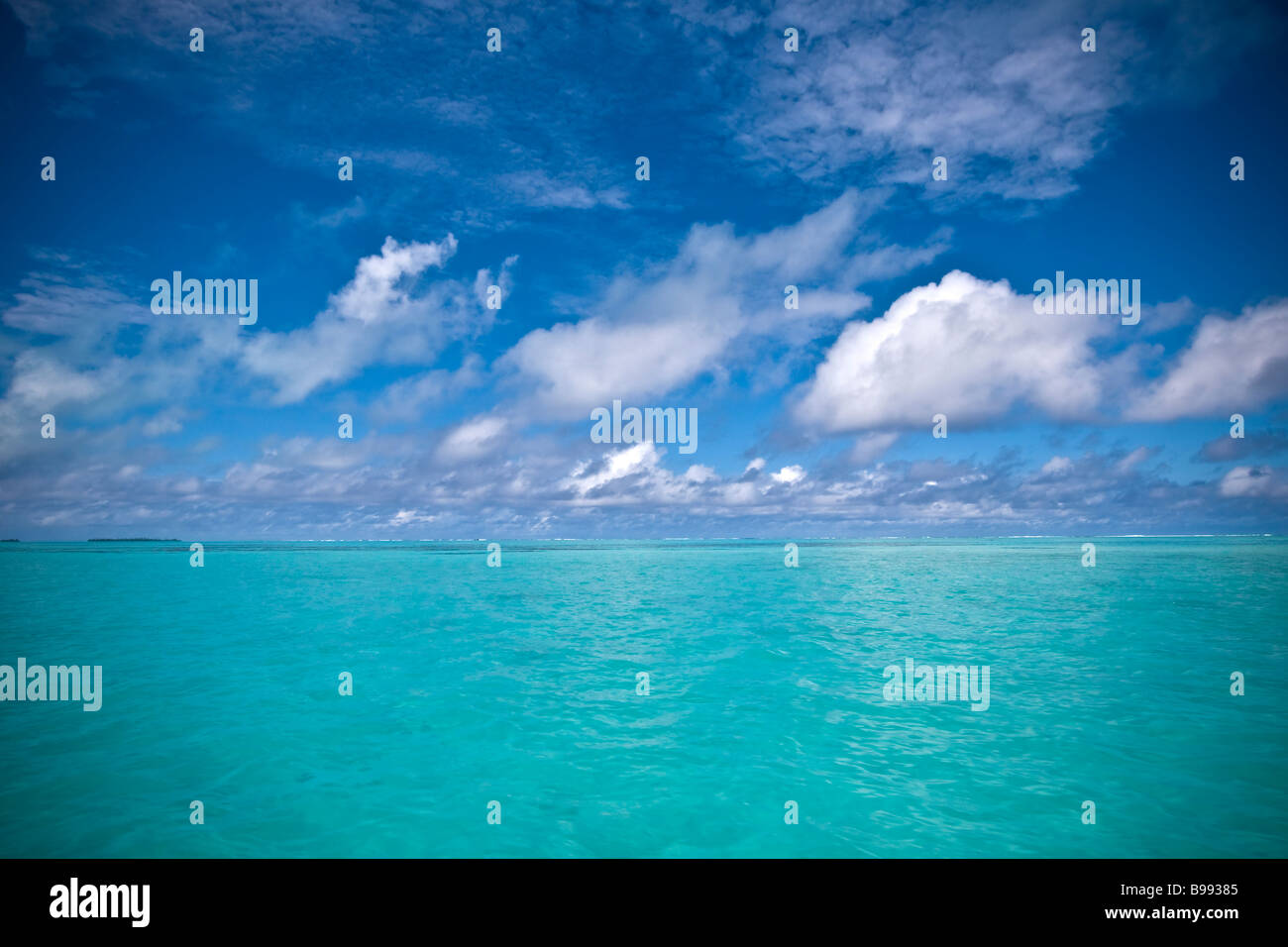 Turqoise water meets sky with Maina Island in background in a vignette ...