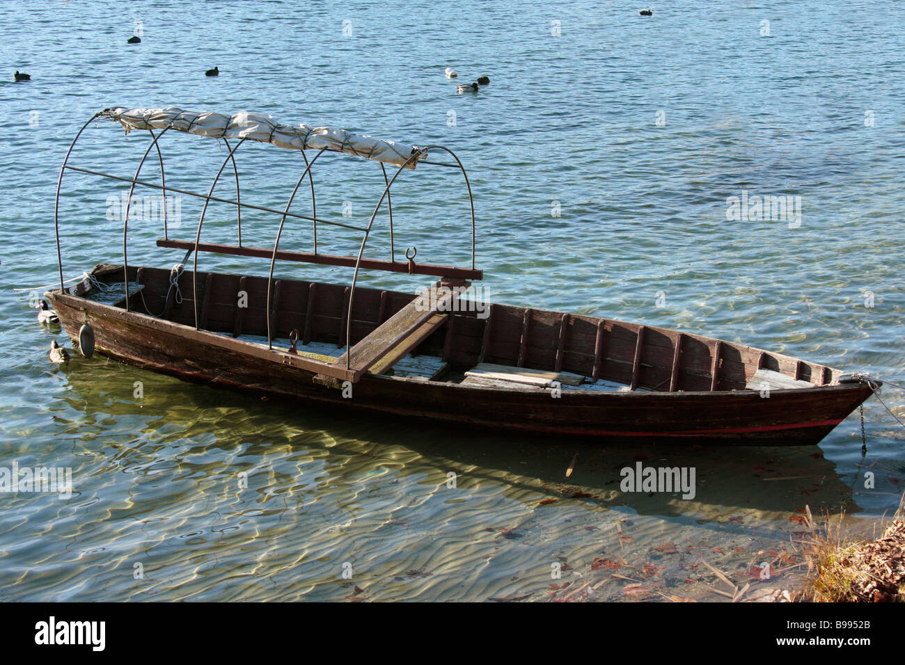 Typical wooden boat on Lake Maggiore, Italy Stock Photo - Alamy