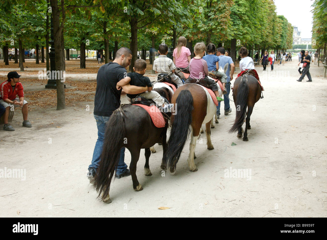 Horse riding in a Parisien park Stock Photo - Alamy