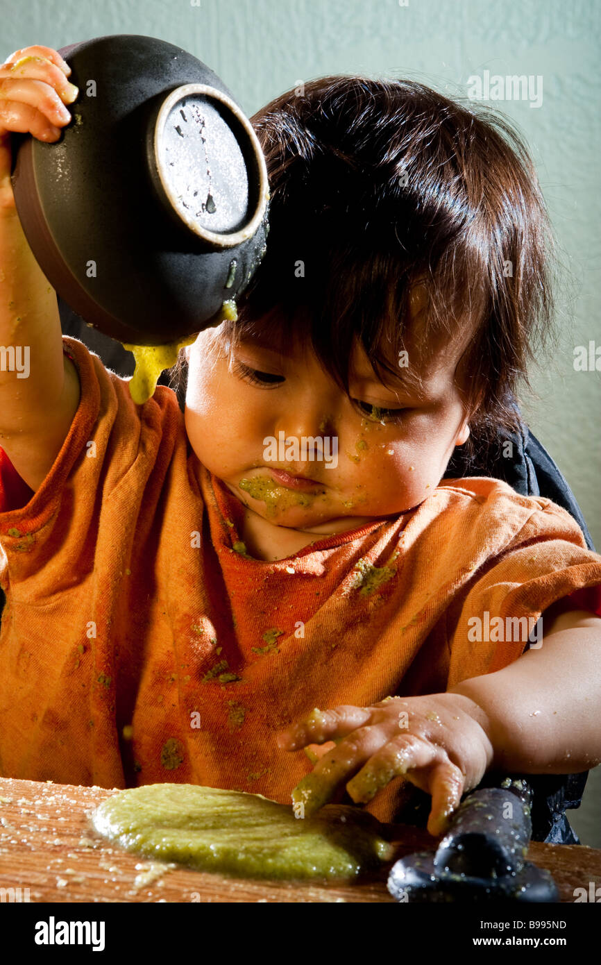 Baby making mess hi-res stock photography and images - Alamy