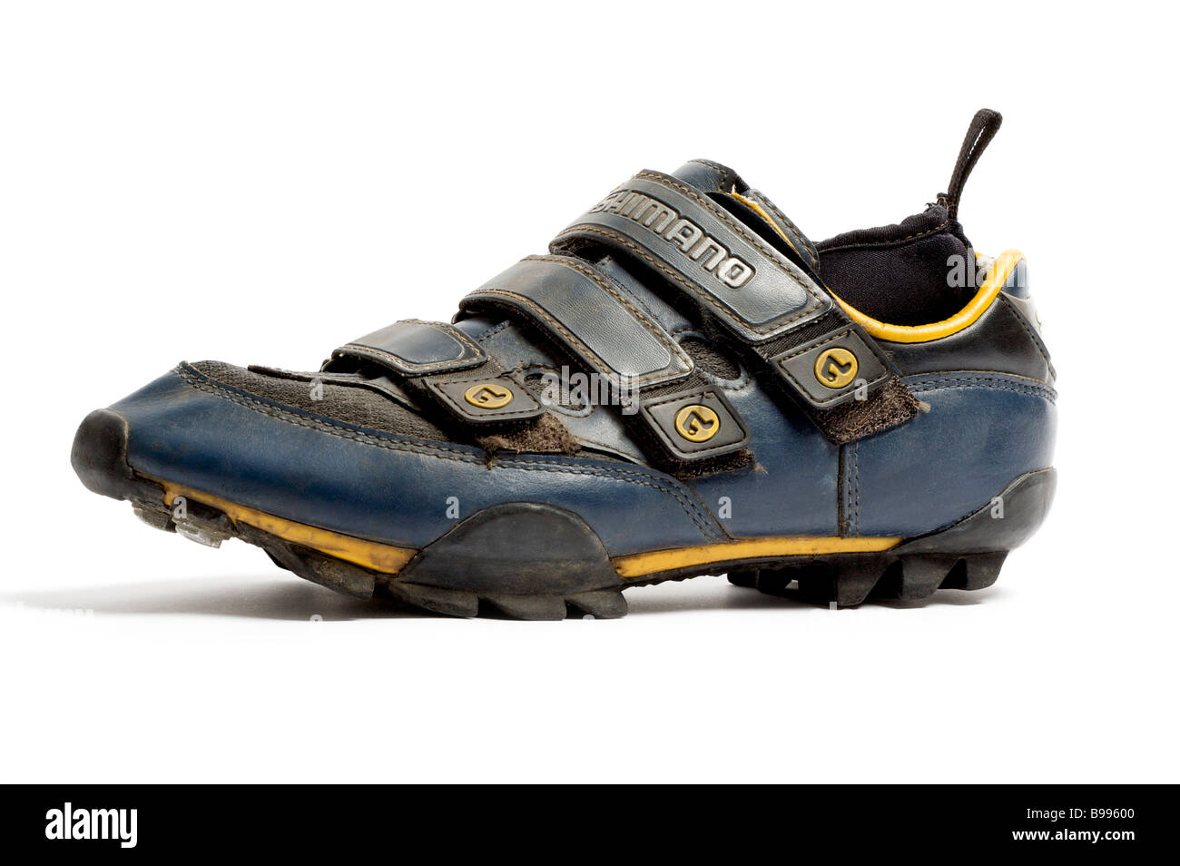 Old cycling shoe on white background Stock Photo - Alamy