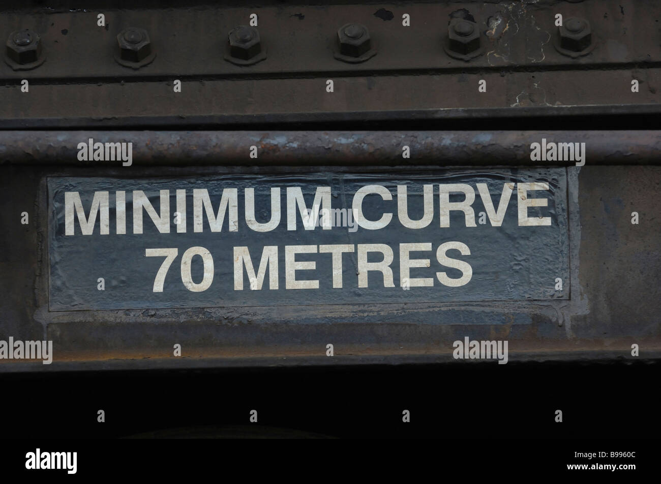Minimum Curve 70 metres instruction sign on the side of an old freight ...