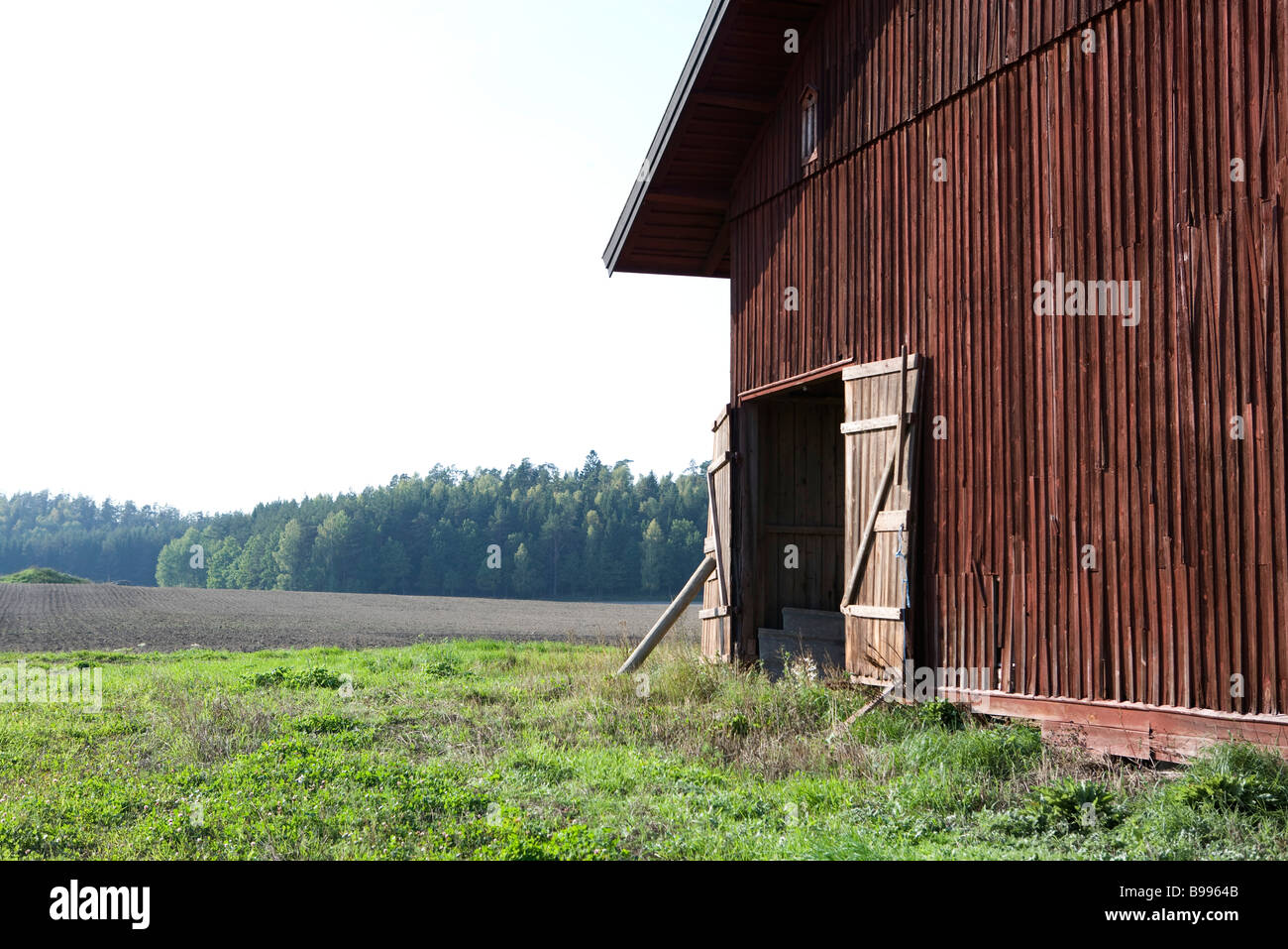 Barn in field, close-up Stock Photo - Alamy
