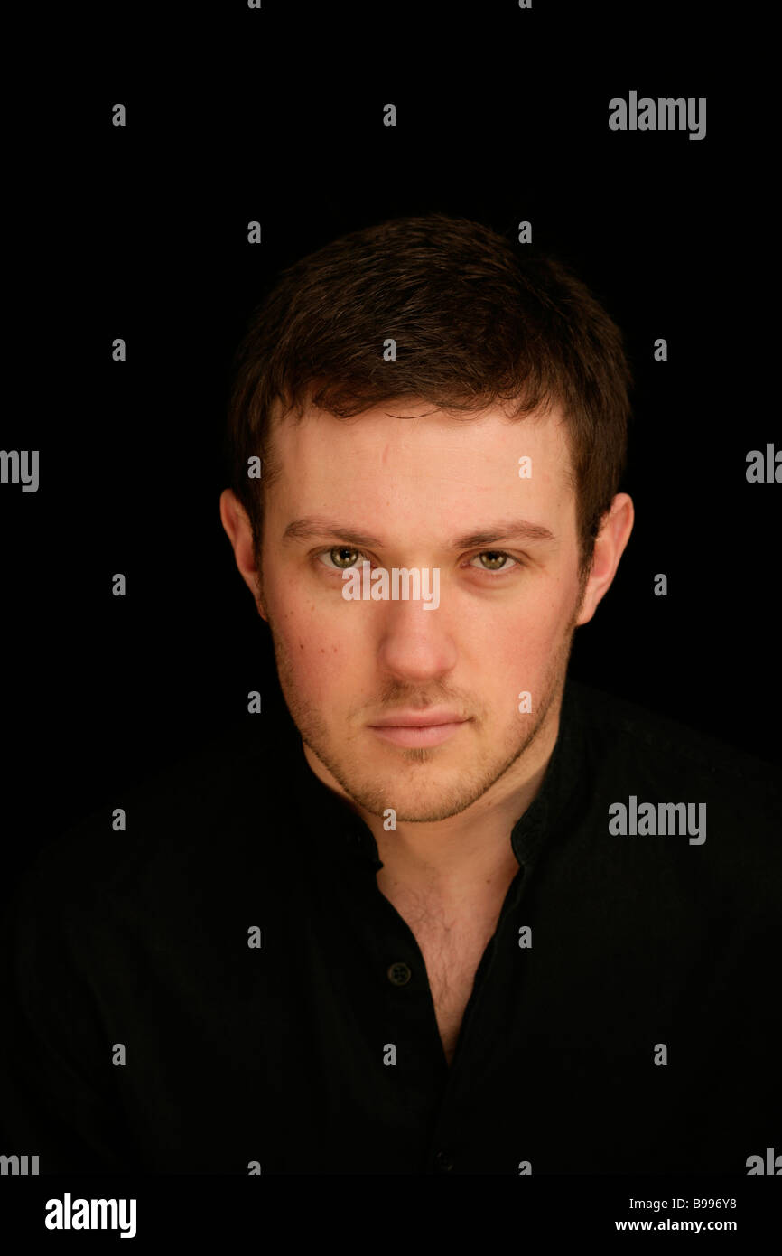 hard man look young handsome man head and shoulders cool confident ...